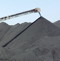 TS1042 & T800-6 stockpiling coal in stockyard